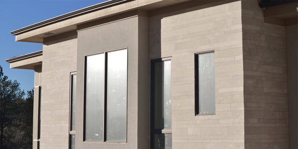 Grey Cladding Facade & Fireplace - Architessa